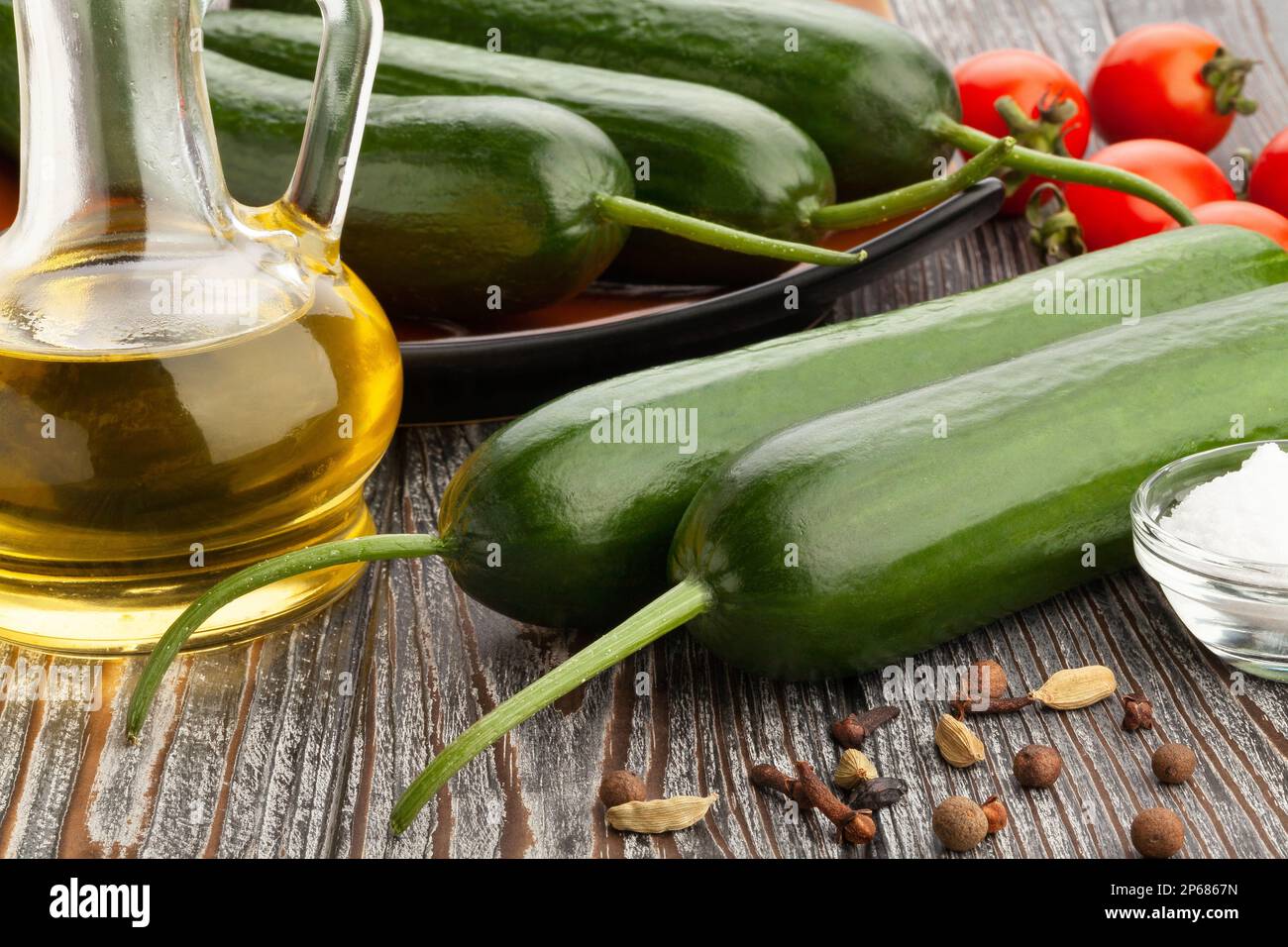 cucumber group on wood background Stock Photo - Alamy