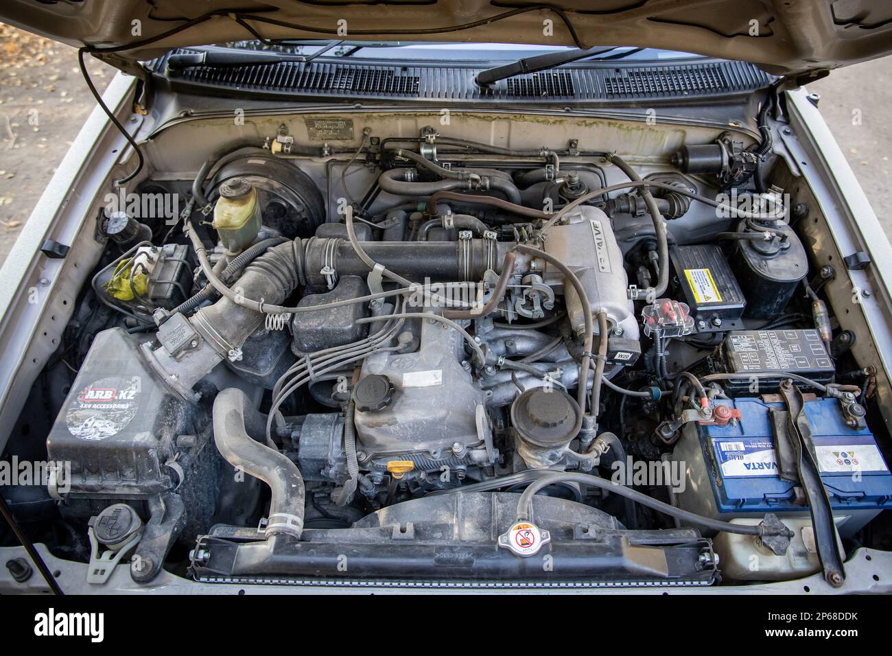 Old Toyota Hilux Surf used engine under the hood of a car Stock Photo ...