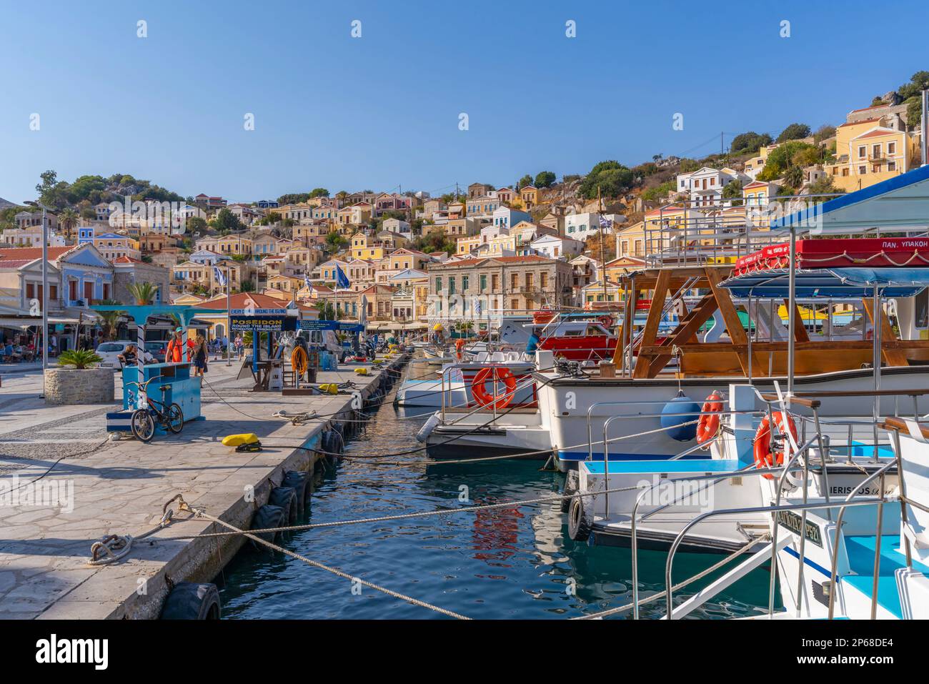 View of boats in harbour in Symi Town, Symi Island, Dodecanese, Greek ...