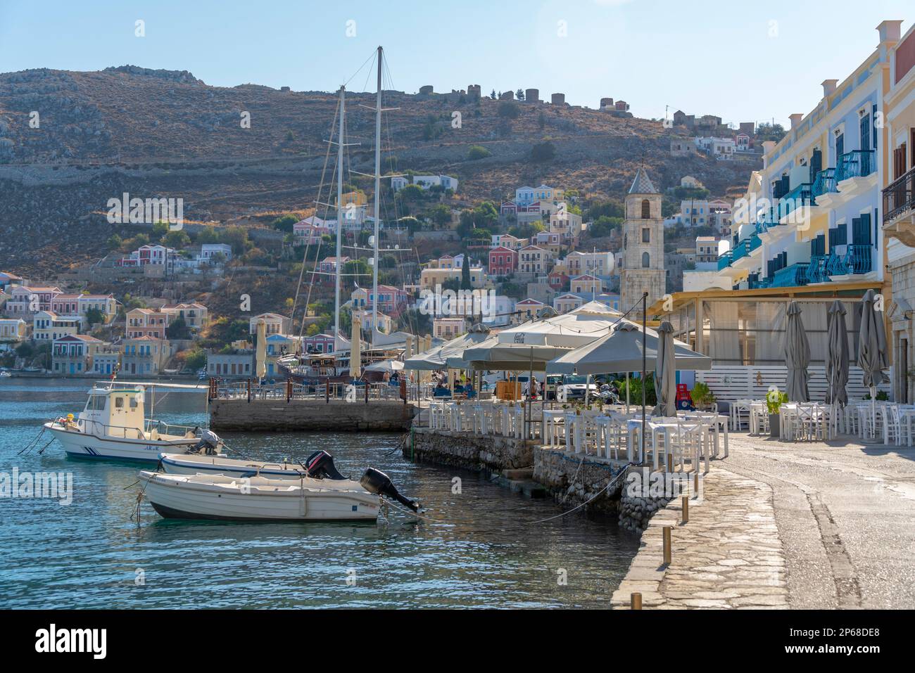 View of boats in harbour of Symi Town, Symi Island, Dodecanese, Greek ...