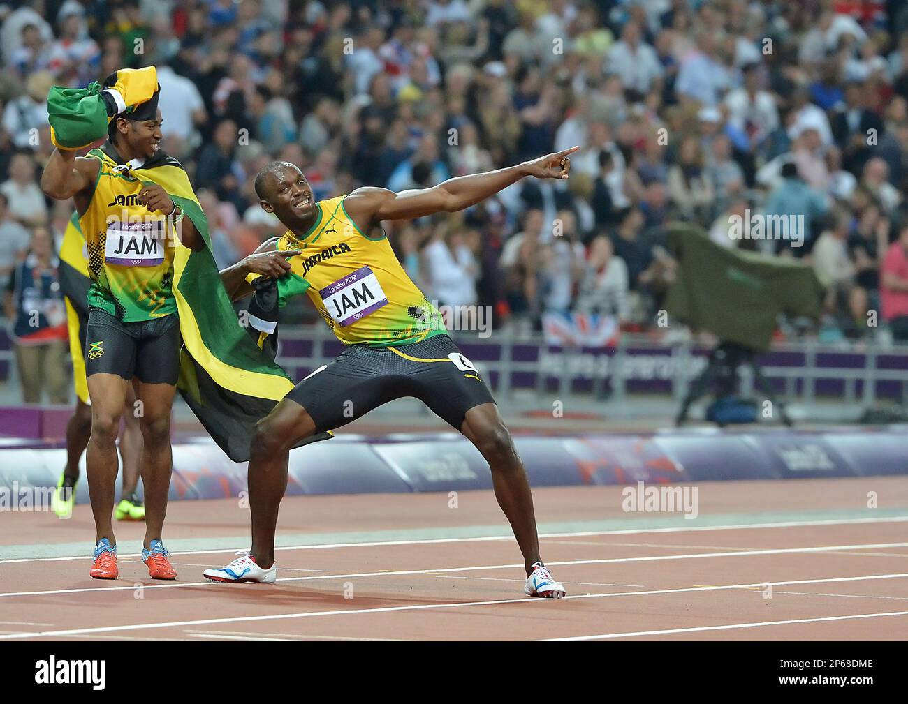 Jamaica s Men s 4 X 100m Team Yohan Blake And Usain Bolt After Winning jamaica-s-men-s-4-x-100m-team-yohan-blake-and-usain-bolt-after-winning