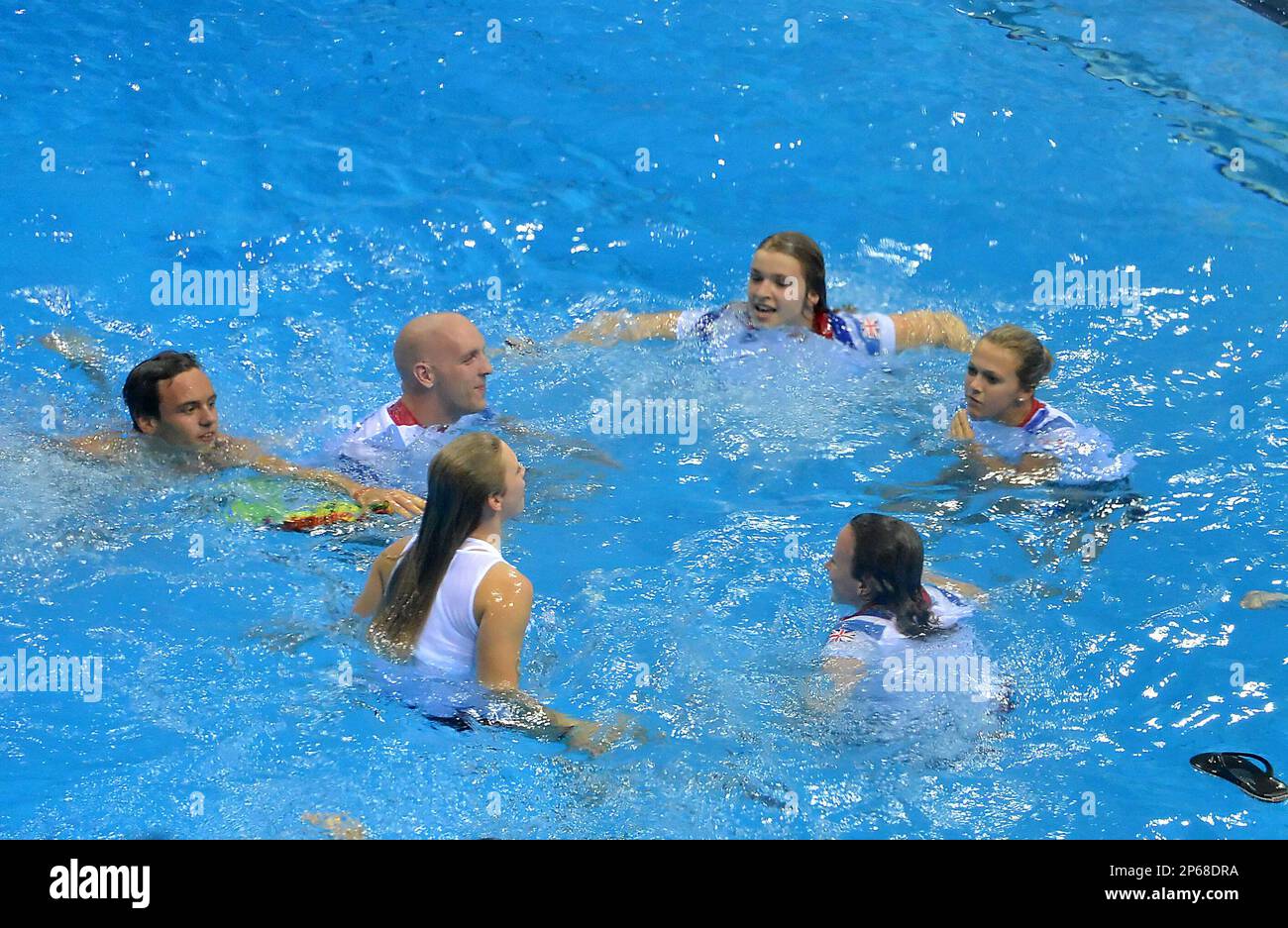Great Britain's diving team celebrate Tom Daley's Bronze Medal in the ...