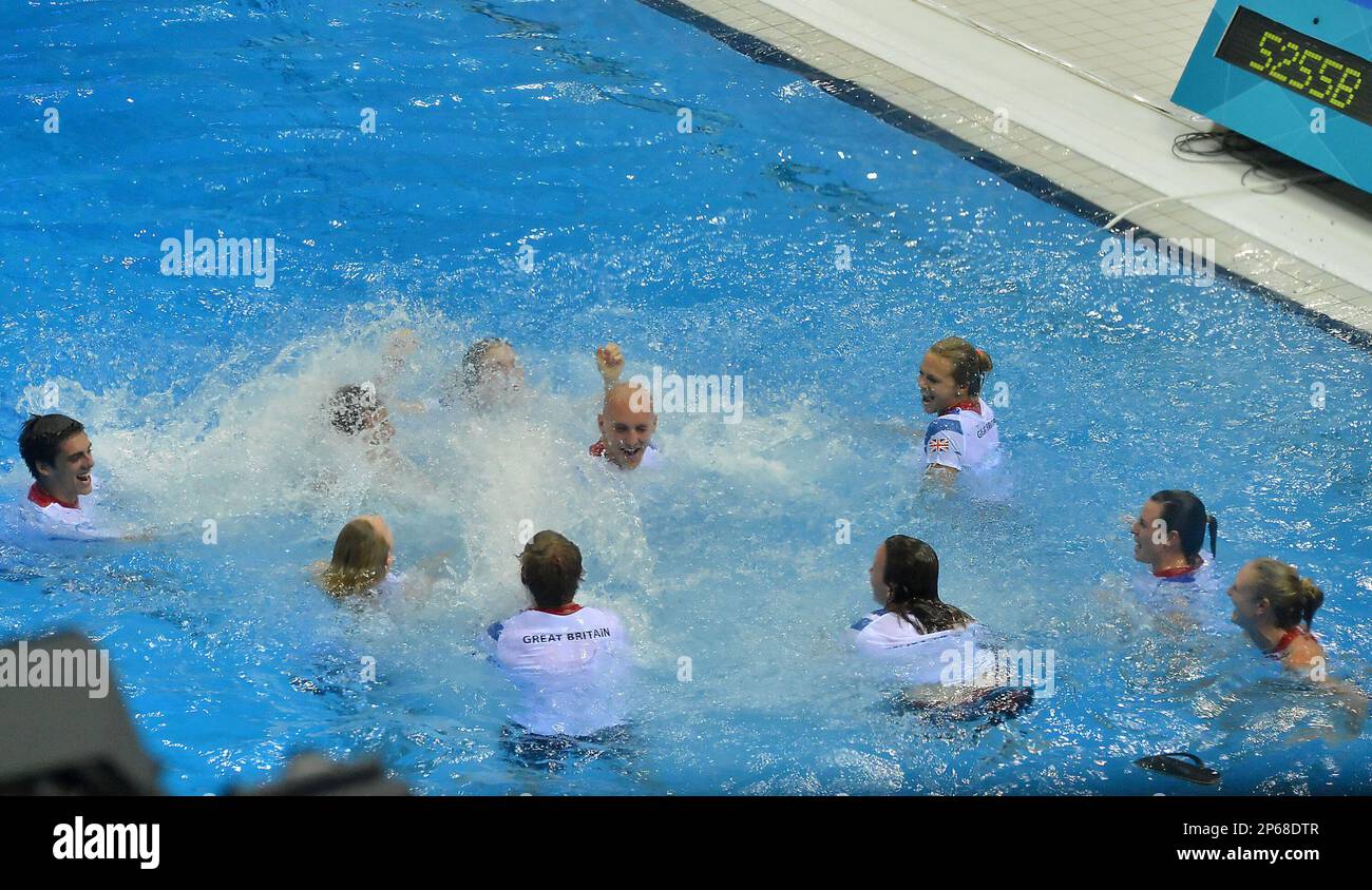Great Britain's diving team celebrate Tom Daley's Bronze Medal in the ...