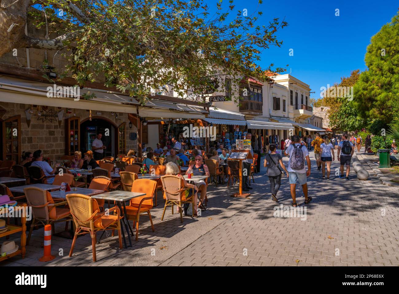 View of bars and restaurants, Rhodes Old Town, Rhodes, Dodecanese ...