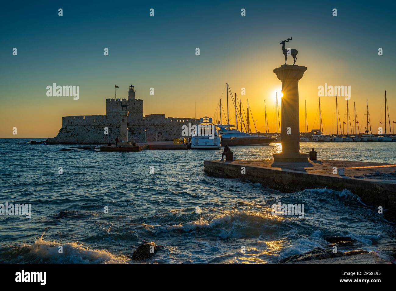 View of bronze stag and doe statues and Saint Nicholas Fortress at ...
