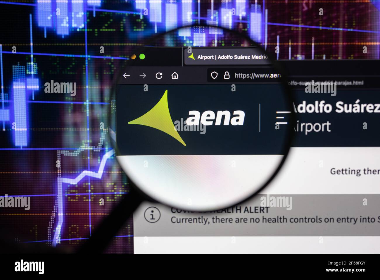Aena airport company logo on a website with blurry stock market ...