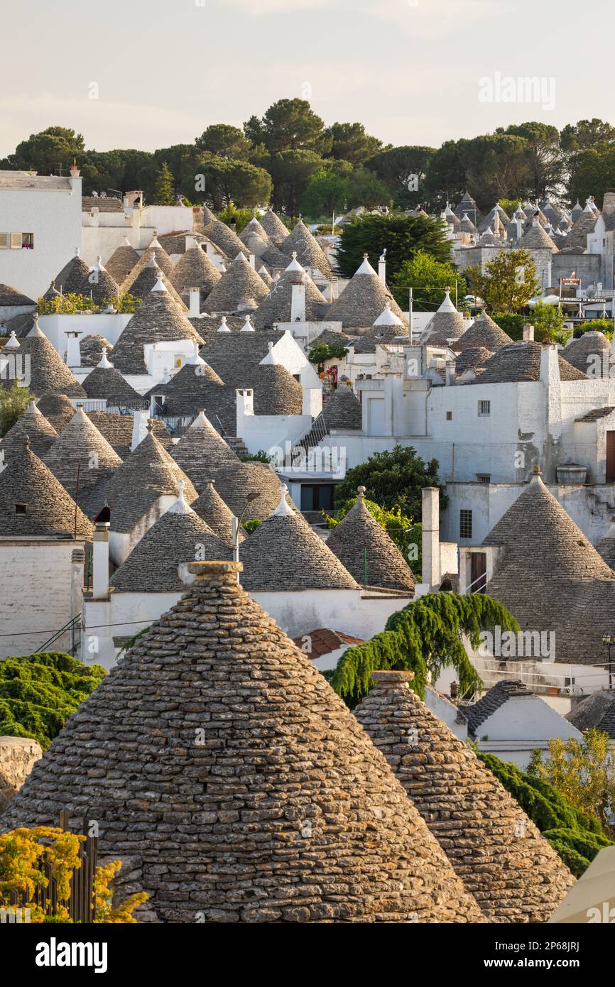 View over conical stone roofs of traditional trulli houses in the old ...