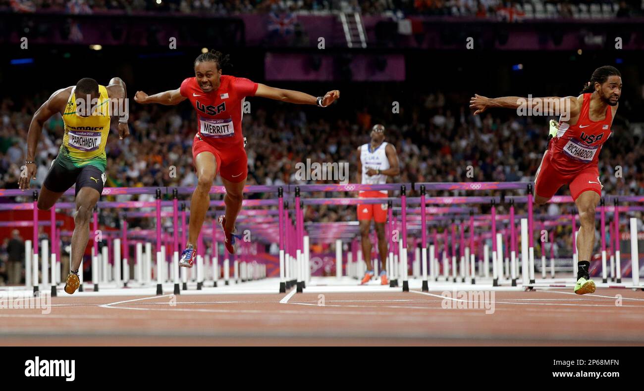United States' Aries Merritt, second from left, crosses the finish line ...
