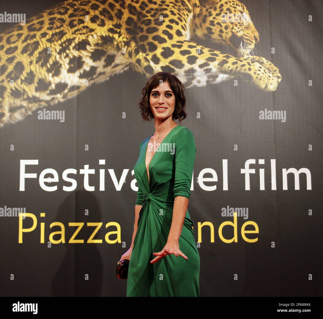 In this picture taken Monday Aug. 6, 2012 US Acress Lizzy Caplan poses ...