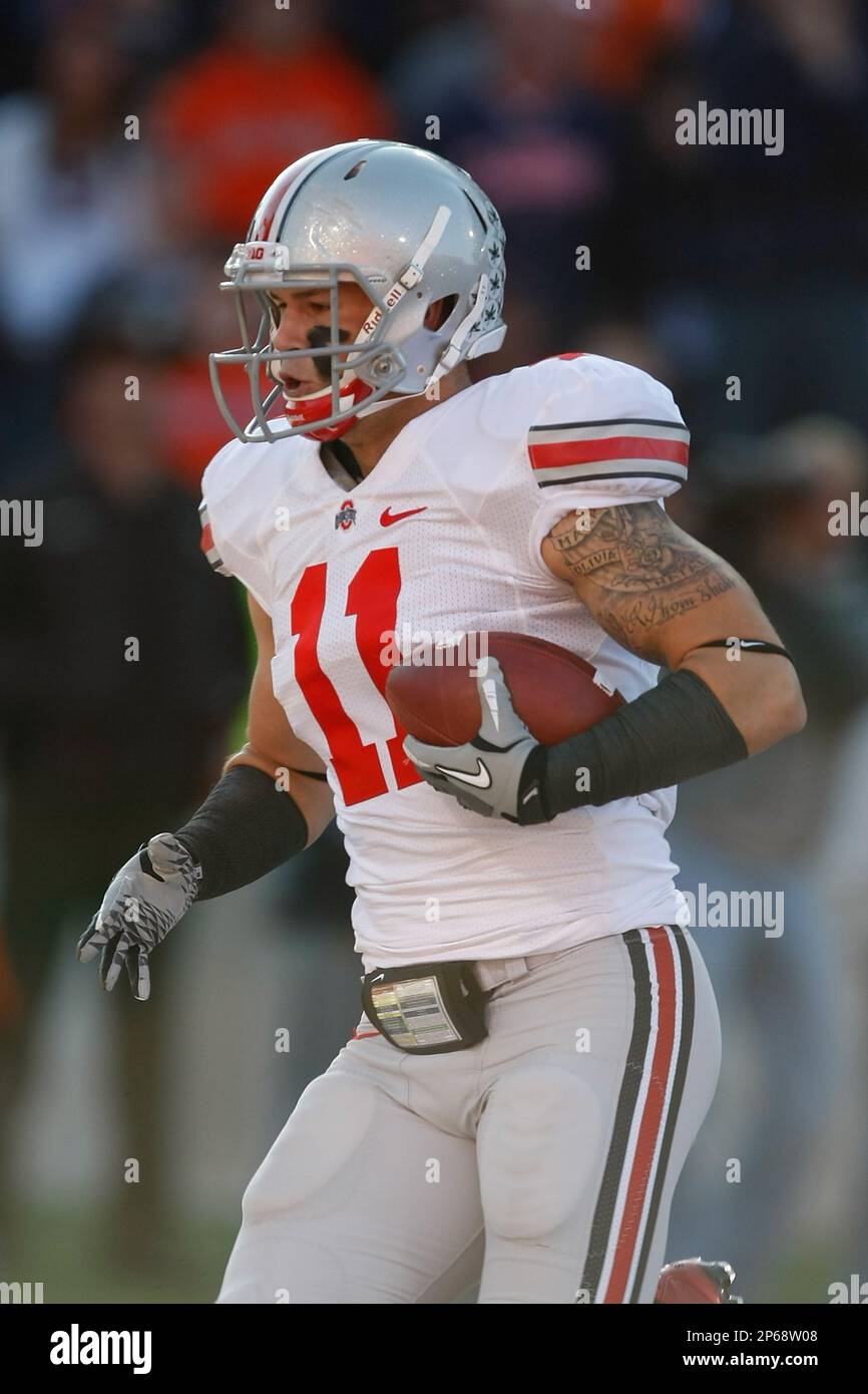 CHAMPAIGN, IL - OCTOBER 15: Jake Stoneburner #11 of the Ohio State ...