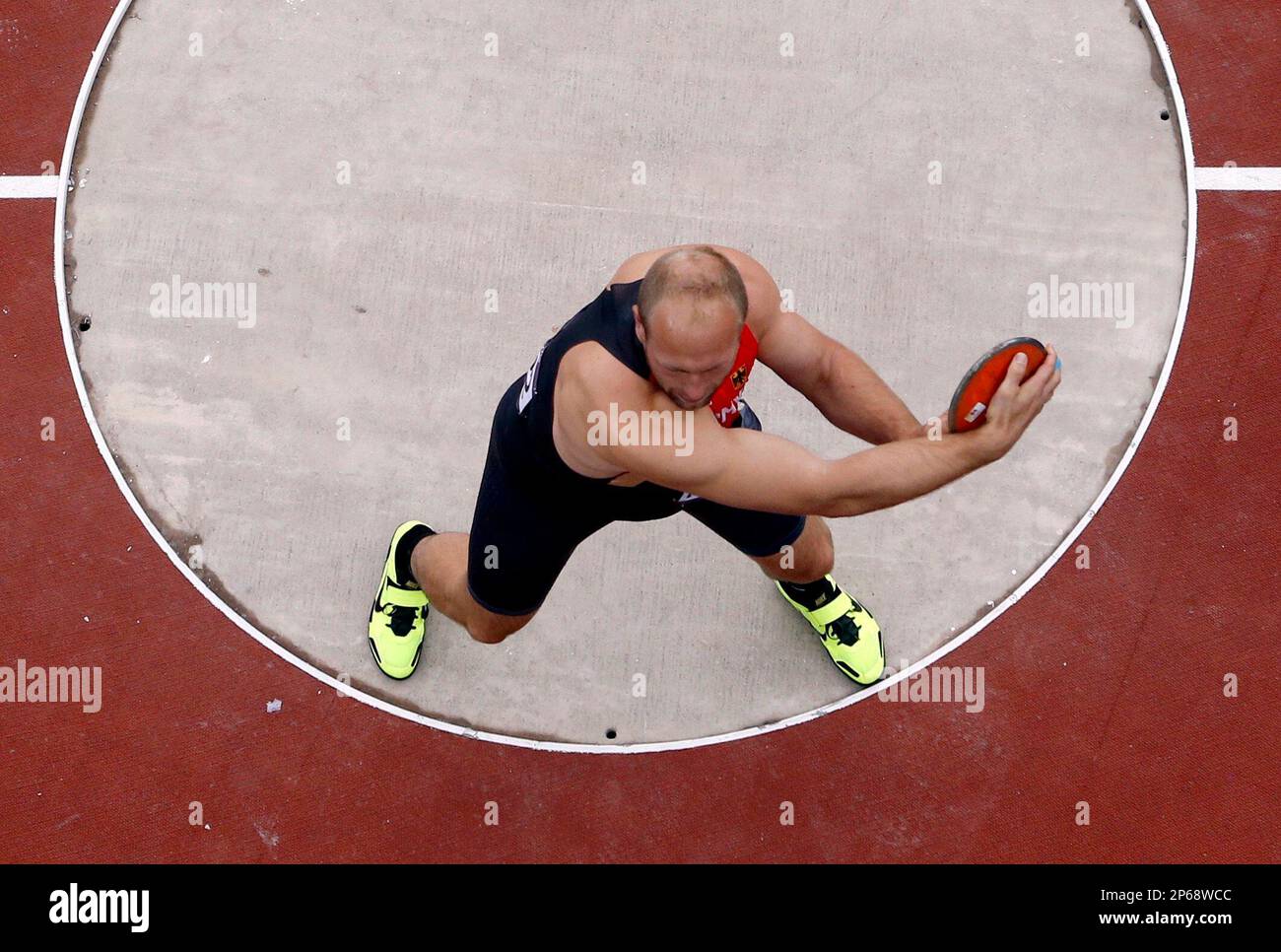 Germany's Robert Harting competes in the men's discus qualification ...