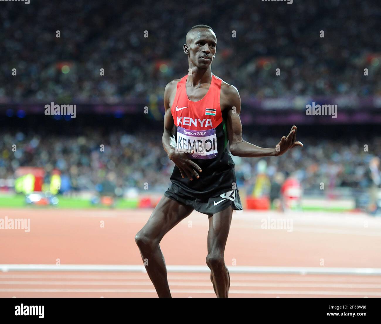 Kenyan Athlete Ezekiel Kemboi celebrates winning the 3000 meter steeple ...