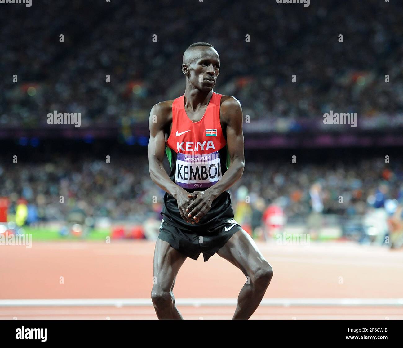 Kenyan Athlete Ezekiel Kemboi celebrates winning the 3000 meter steeple ...