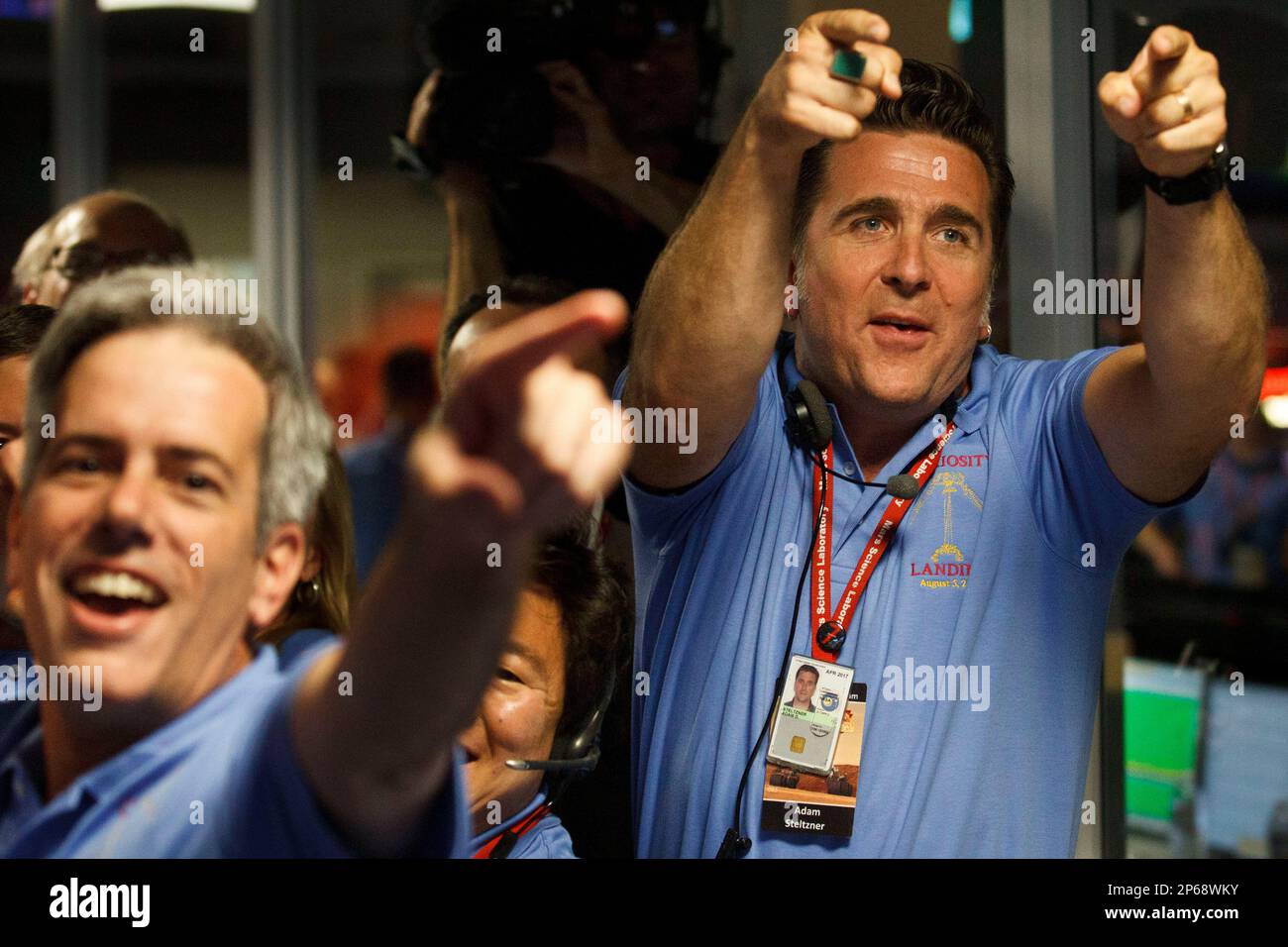 Adam Steltzner, right, celebrates a successful landing inside the ...