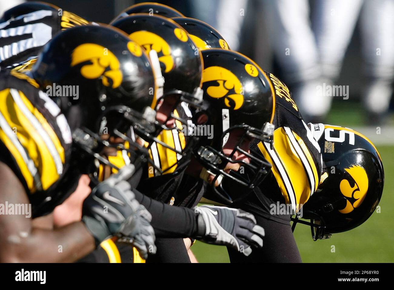 IOWA CITY, IA - OCTOBER 31: Iowa Hawkeyes players line up at the line ...
