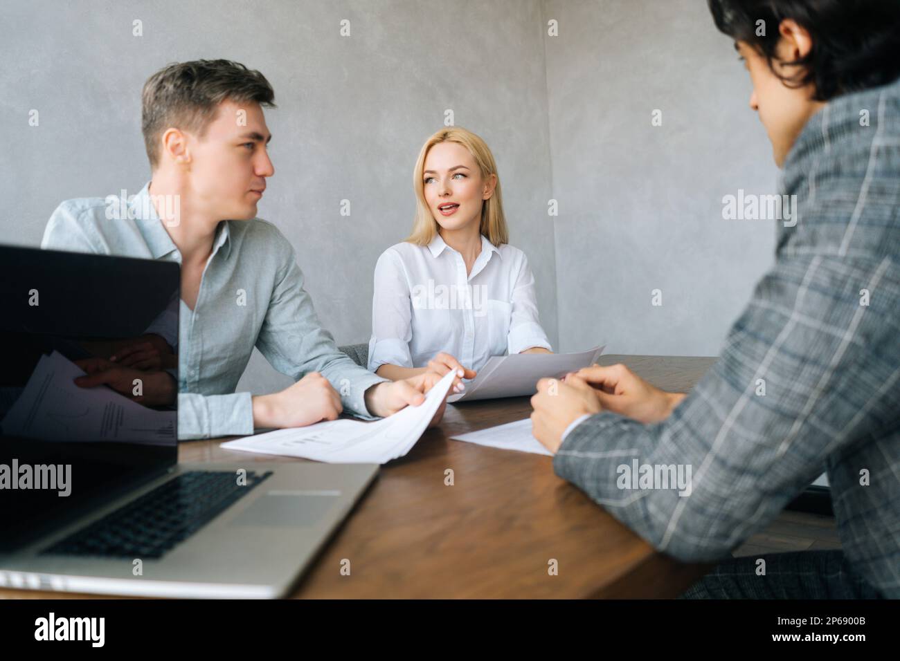 Serious employers meeting talking job hi-res stock photography and ...