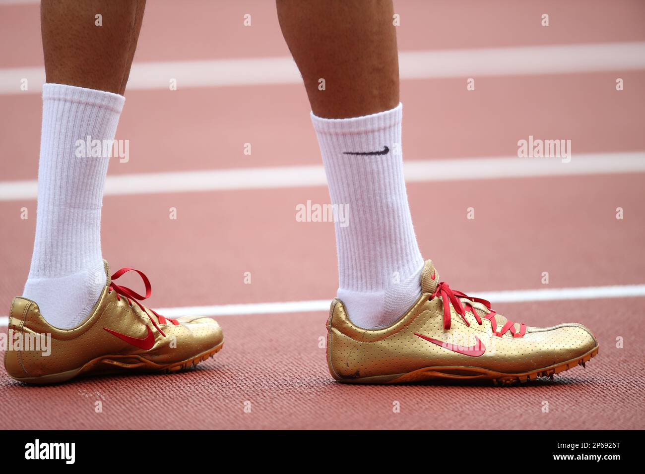 Golden shoes on the track during the 400m meter race at Olympic Stadium ...