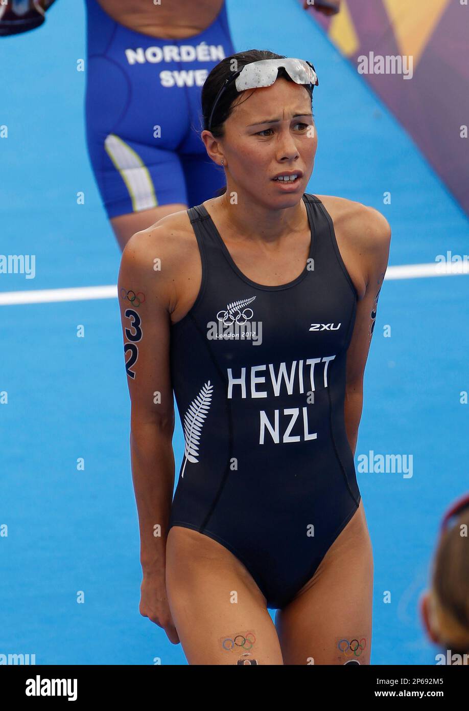 New Zealand's Andrea Hewitt finishes the Women's Triathlon Competition ...