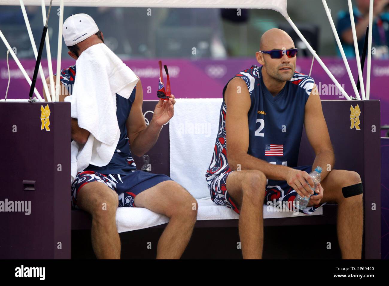 Todd Rogers (L) and Phil Dalhausser of the United States react during ...