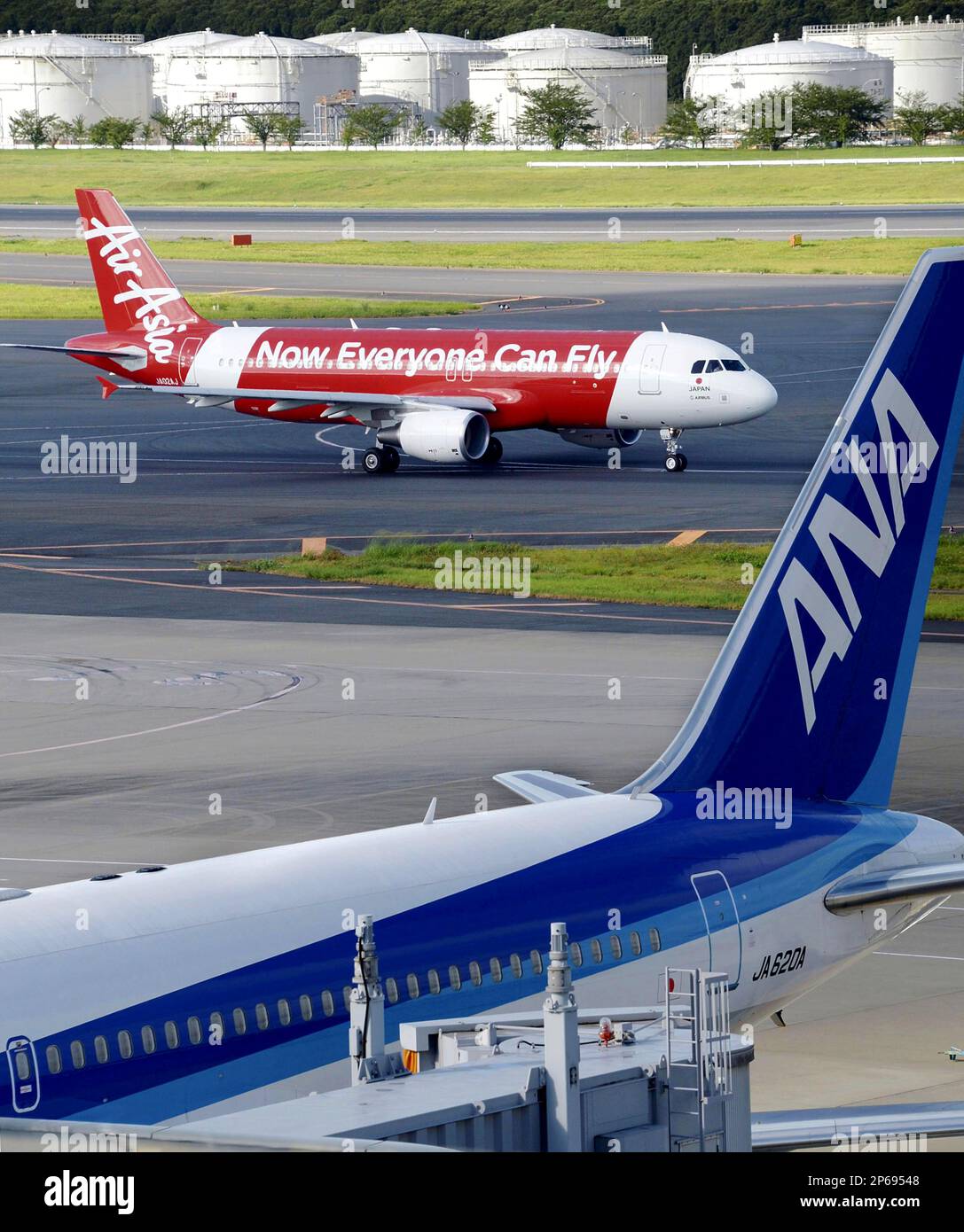 The first flight of Air Asia Japan takes off from Narita International ...