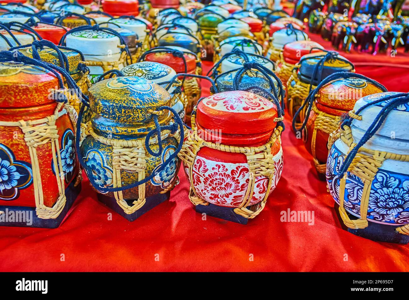 Thai rice boxes of bamboo wood in a stall of Anusarn Night Market ...