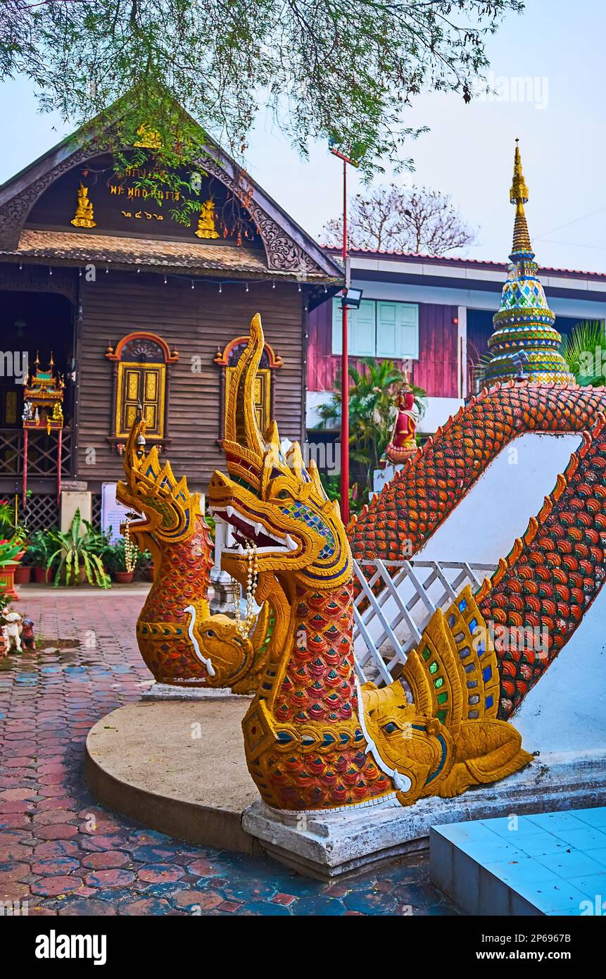 The colored stucco statues of Makara crocodiles, disgorging Naga ...