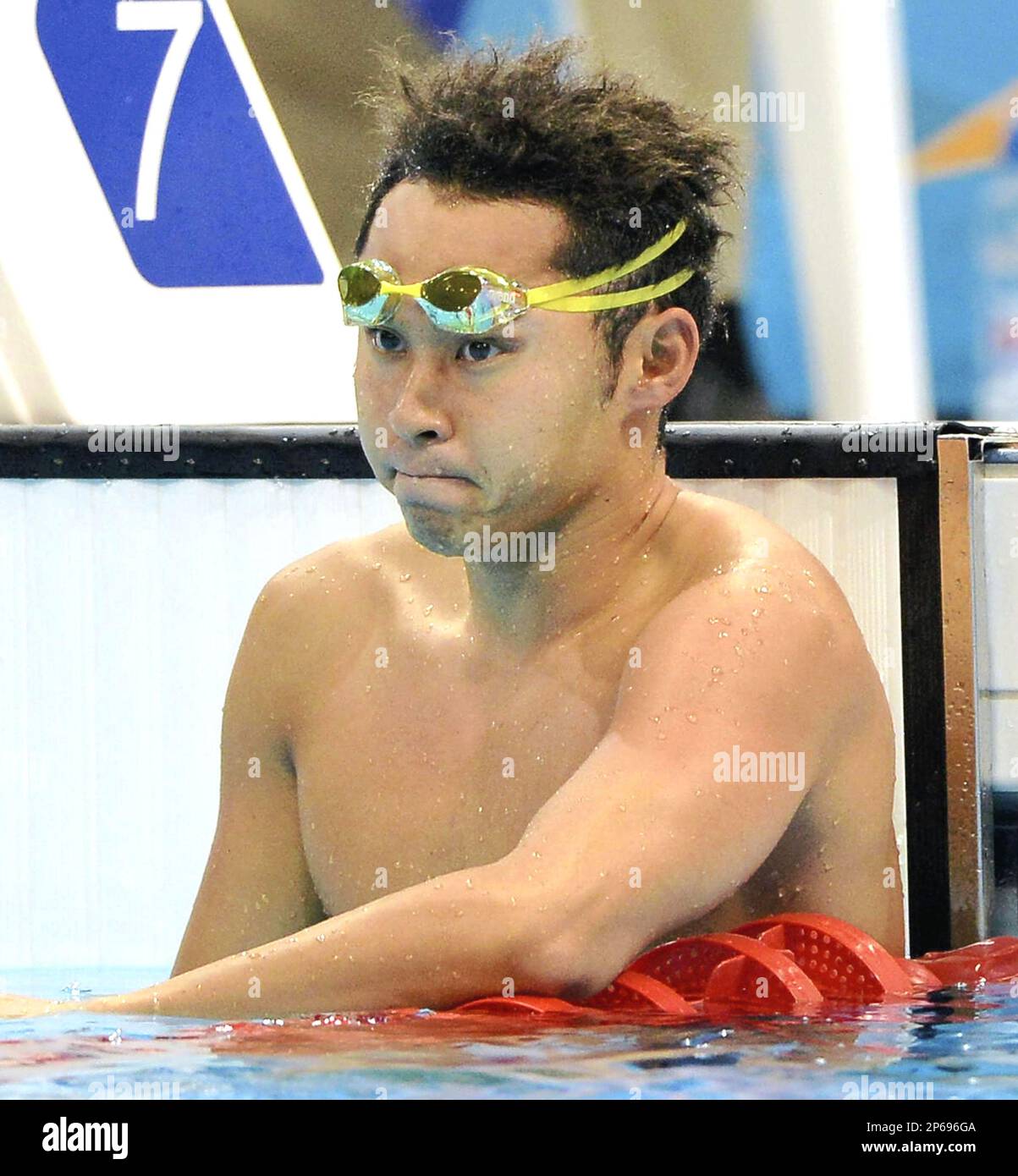 Kosuke Kitajima of Japan grimaces after finishing the 5th place in the men's 100 breaststroke ...