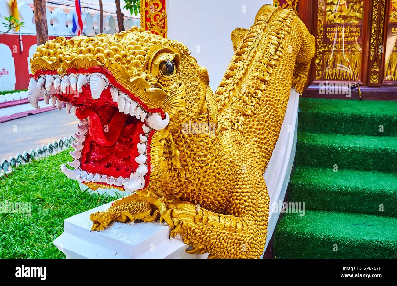 The roaring Mom statue at the Ubosot of Wat Umong Mahathera Chan ...