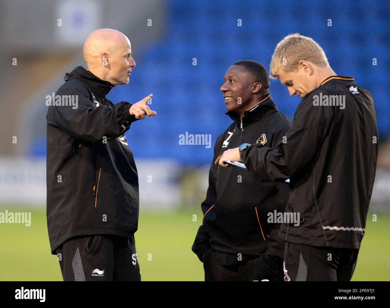 Wolverhampton Wanderers manager Stale Solbakken (left) shares a joke ...