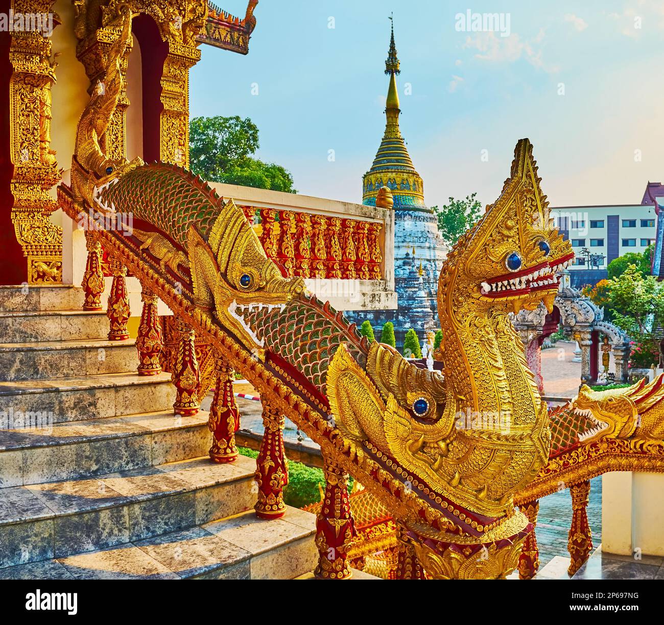 The statues of Makara creatures, disgorging three-headed Naga serpent ...