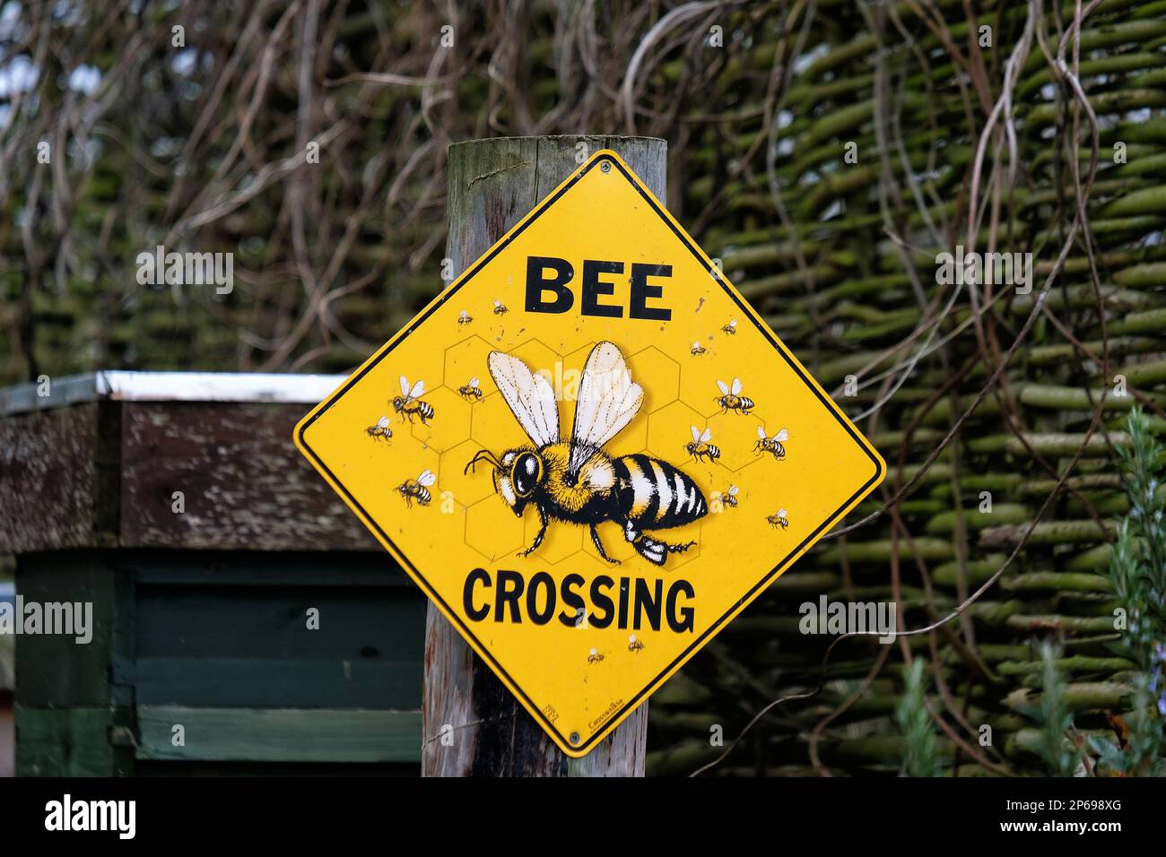 Sign outside bee hives on a UK farm Stock Photo - Alamy