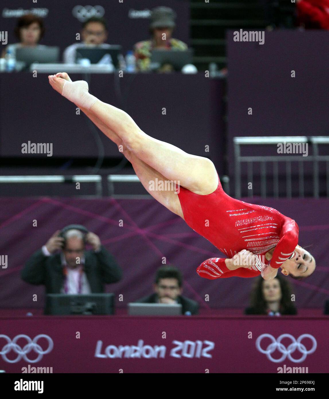 Jordyn Wieber of the United States women's team completes her turn ...