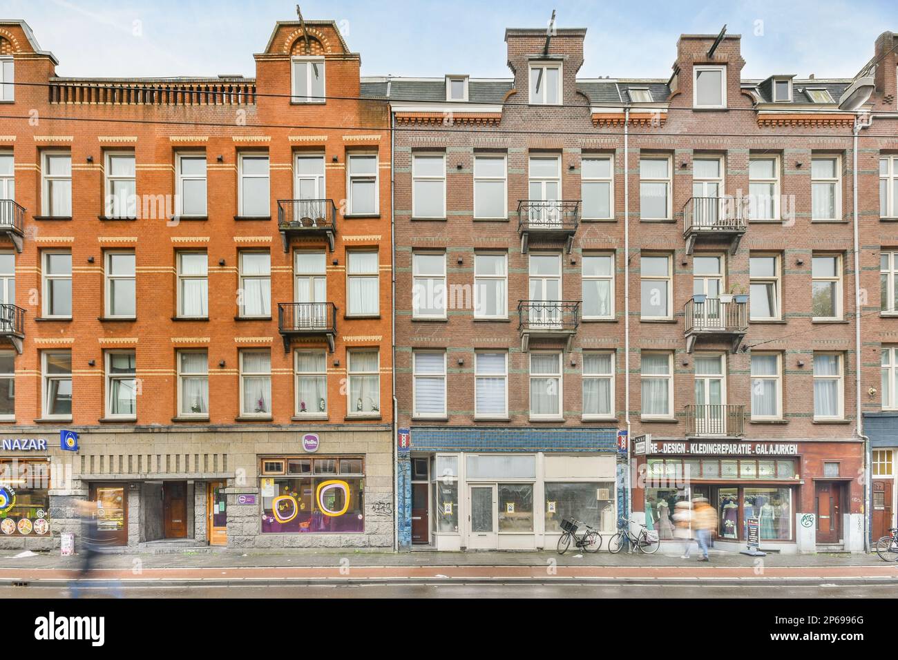 Amsterdam, Netherlands - 10 April, 2021: a city street with buildings ...