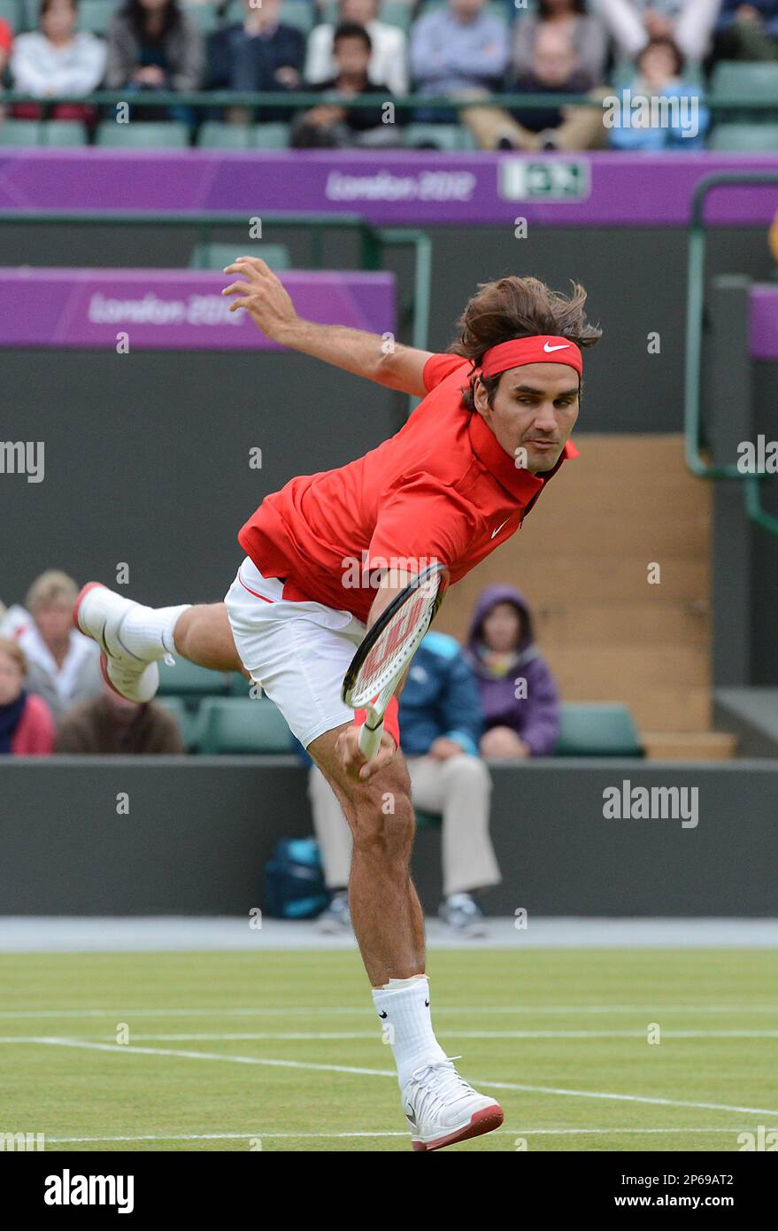 Roger Federer, of Switzerland, in action during his doubles match ...