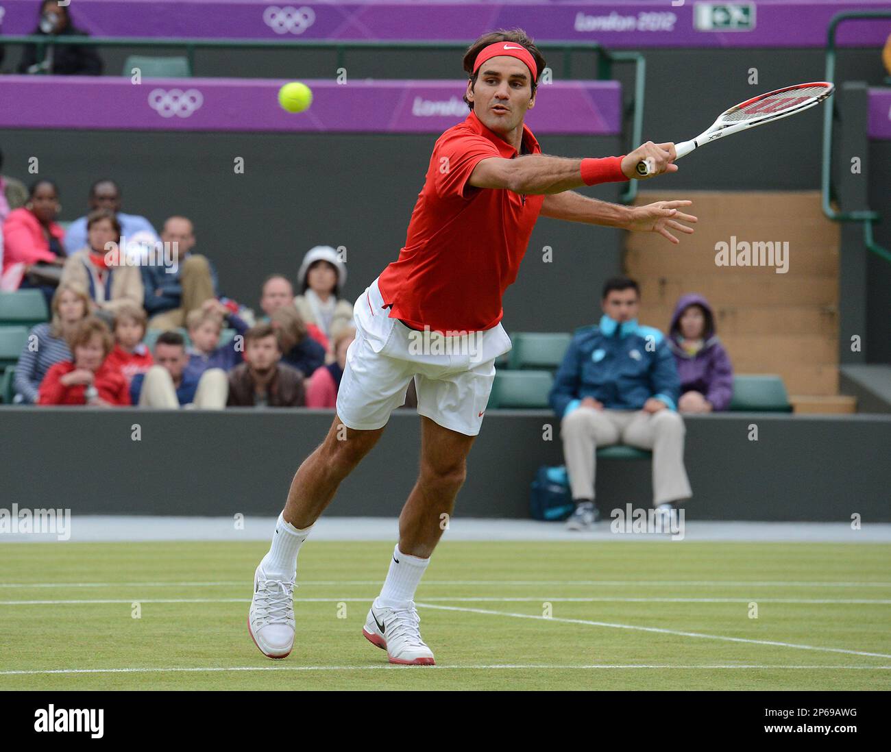 Roger Federer, of Switzerland, in action during his doubles match ...