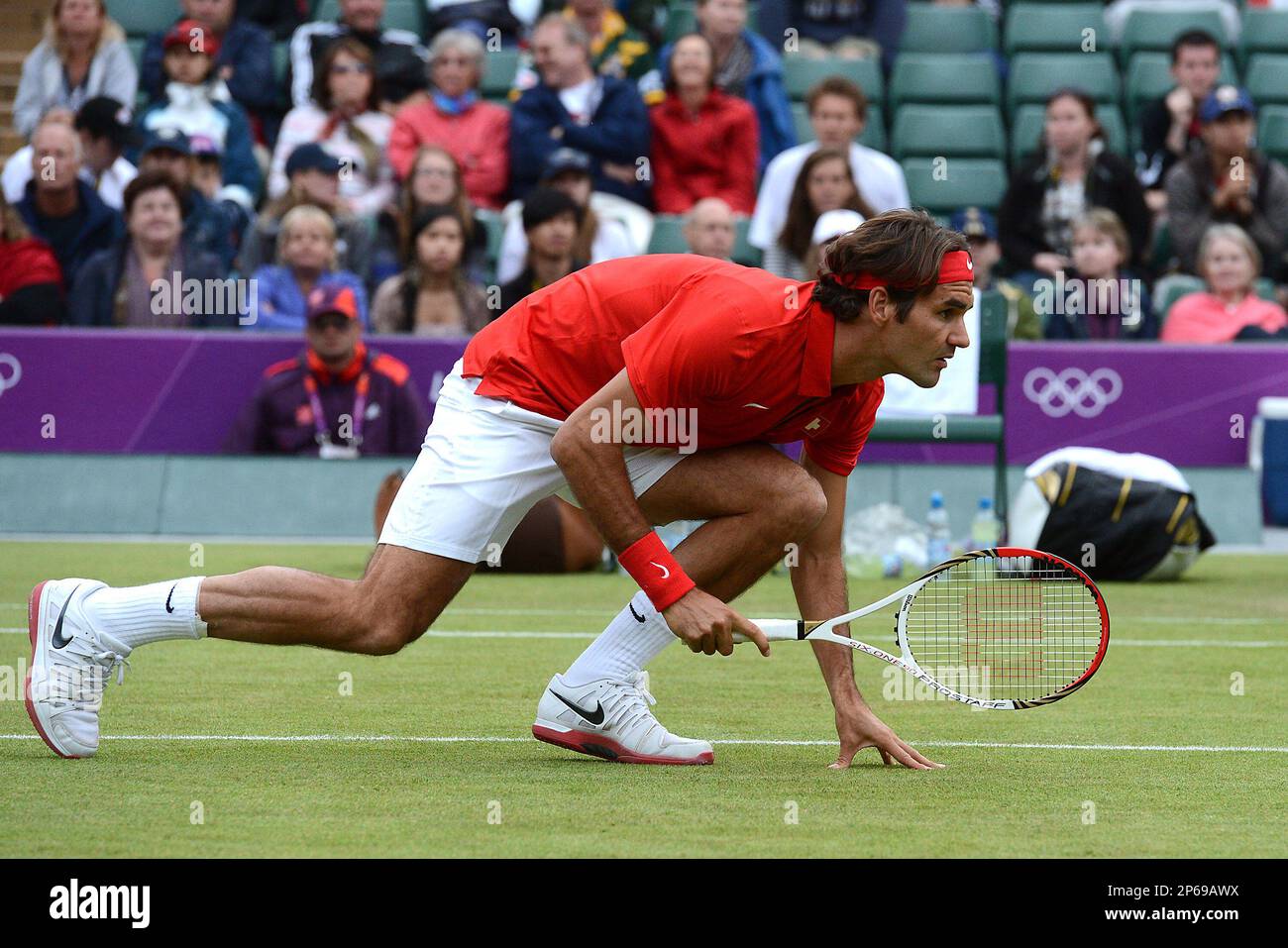 Roger Federer, of Switzerland, in action during his doubles match ...