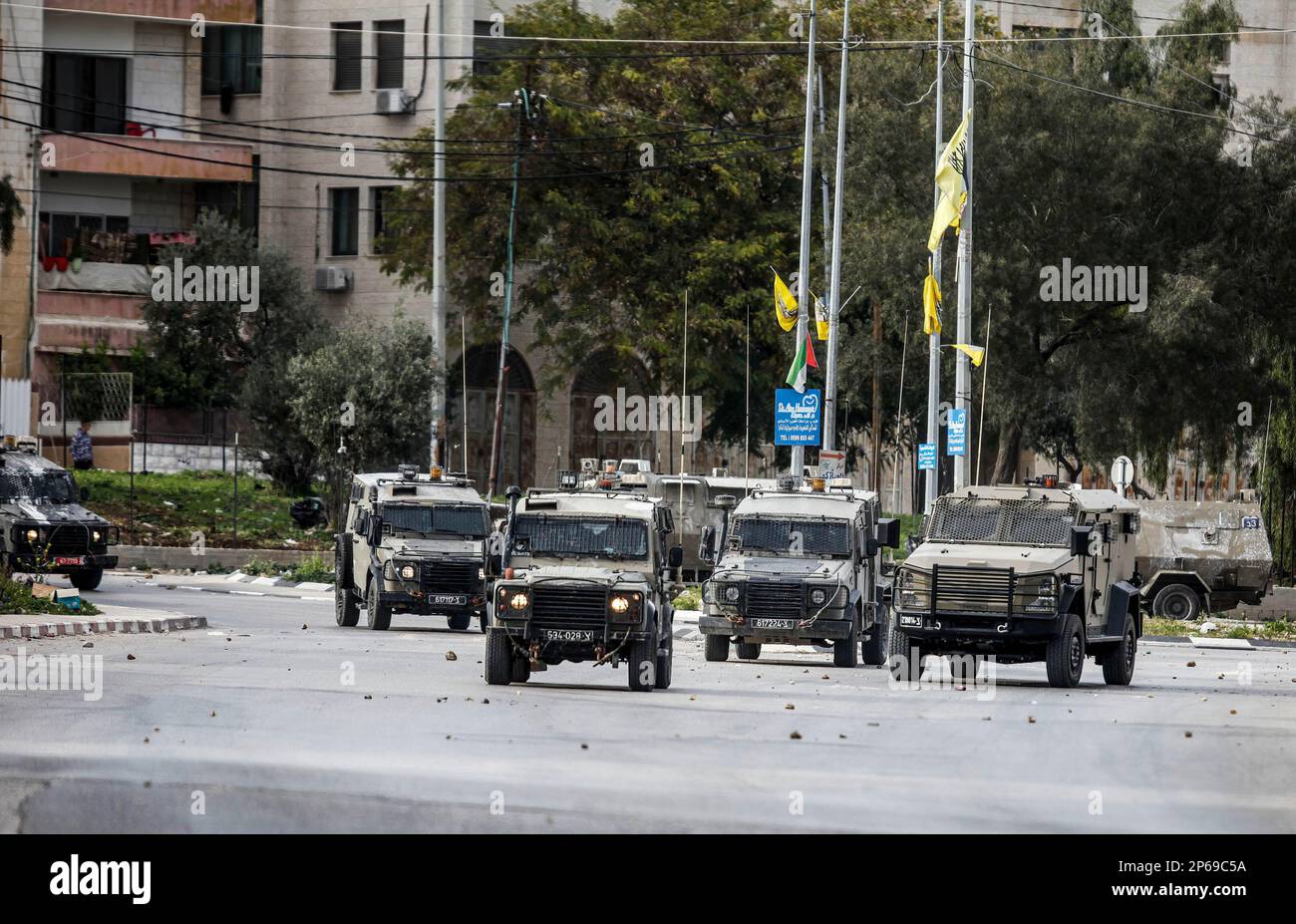 Nablus, Palestine. 07th Mar, 2023. Israeli military vehicles take their ...