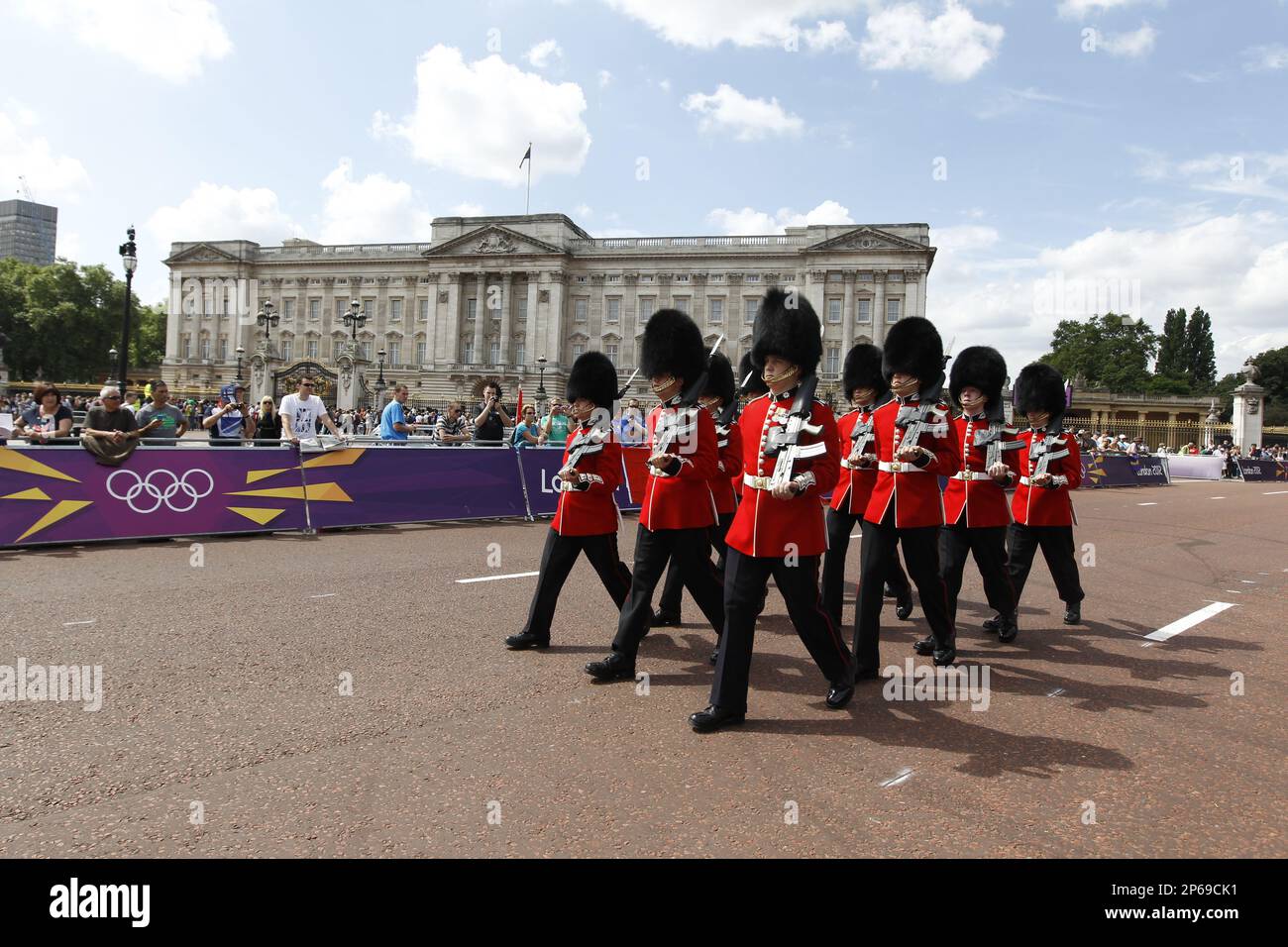 Scenes and signage from the 2012 London Olympics along the Men's Road ...
