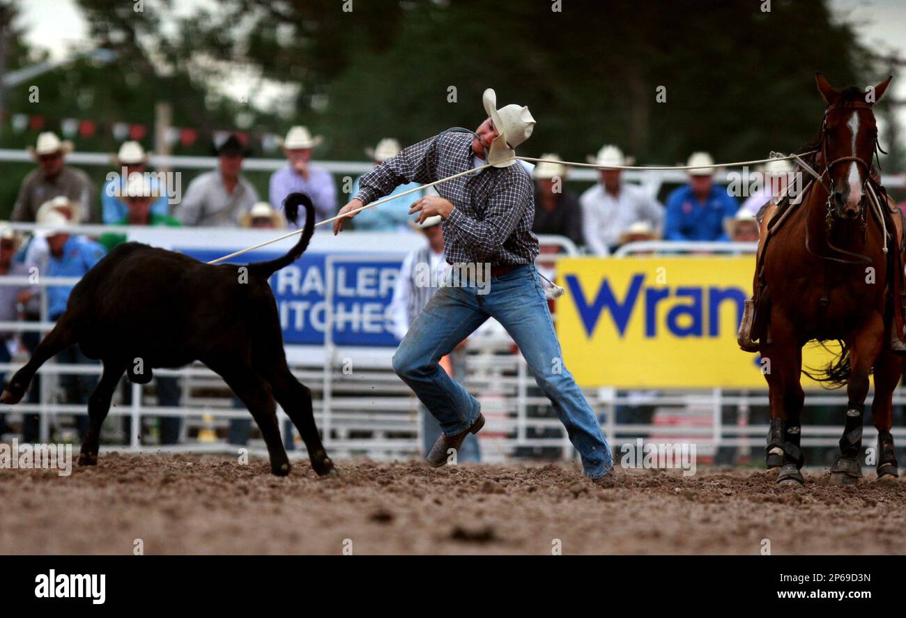 Clint Kindred gets clotheslined by his calf while competing in the tie ...