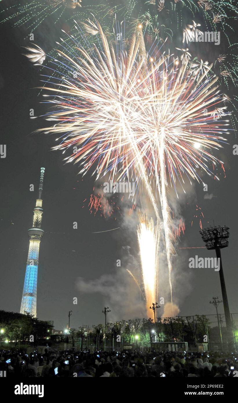 A picture taken by multiple exposure shows fireworks launched with the ...