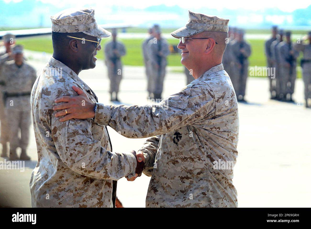 New Air Station Commander Lt. Col. Mitchell Cassell, left, is ...
