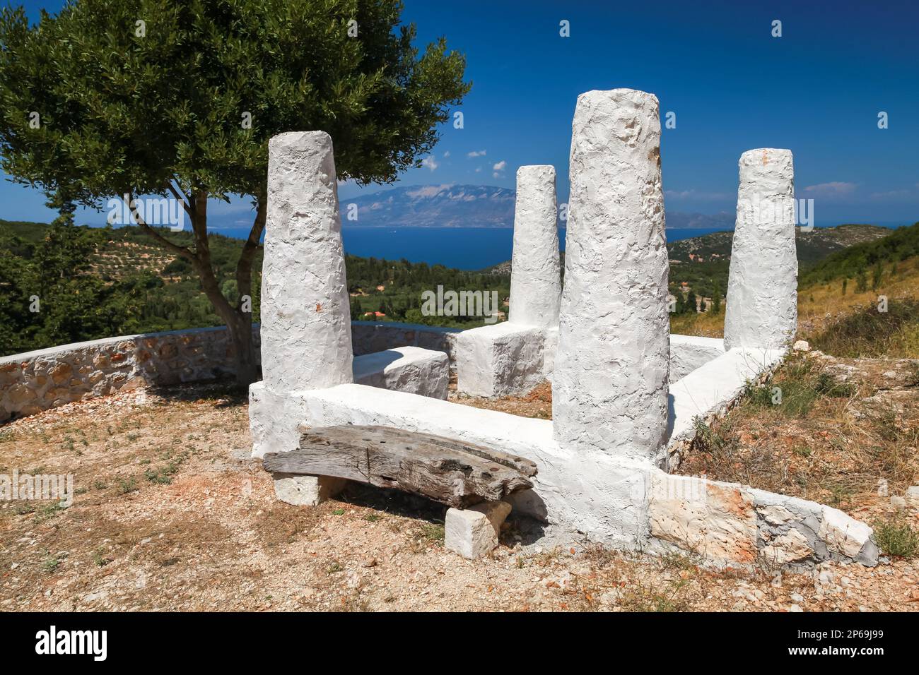 Unfinished white stone gazebo without a roof on a sunny day. Zakynthos ...