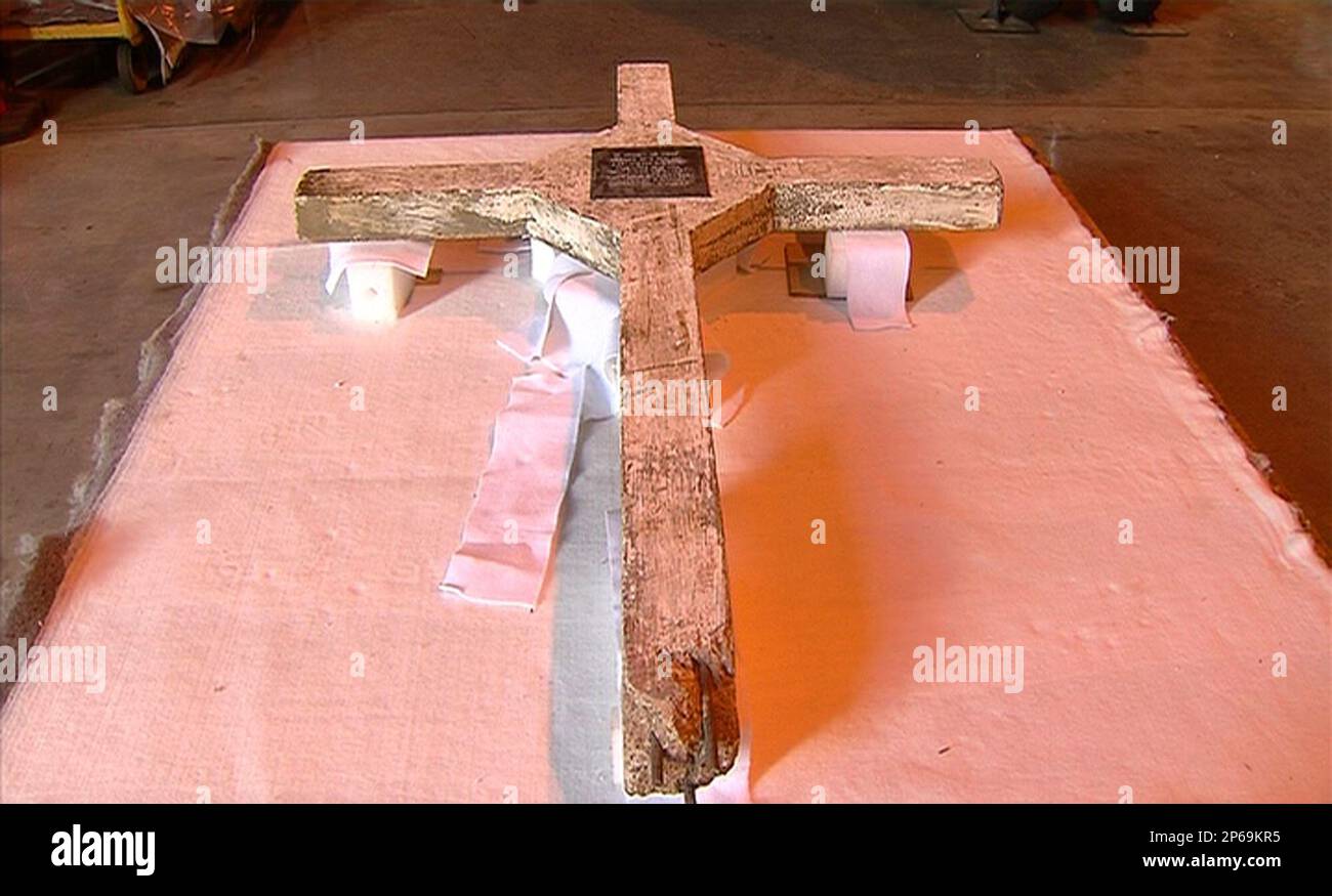 An Australian memorial cross from the Long Tan rubber plantation sits ...