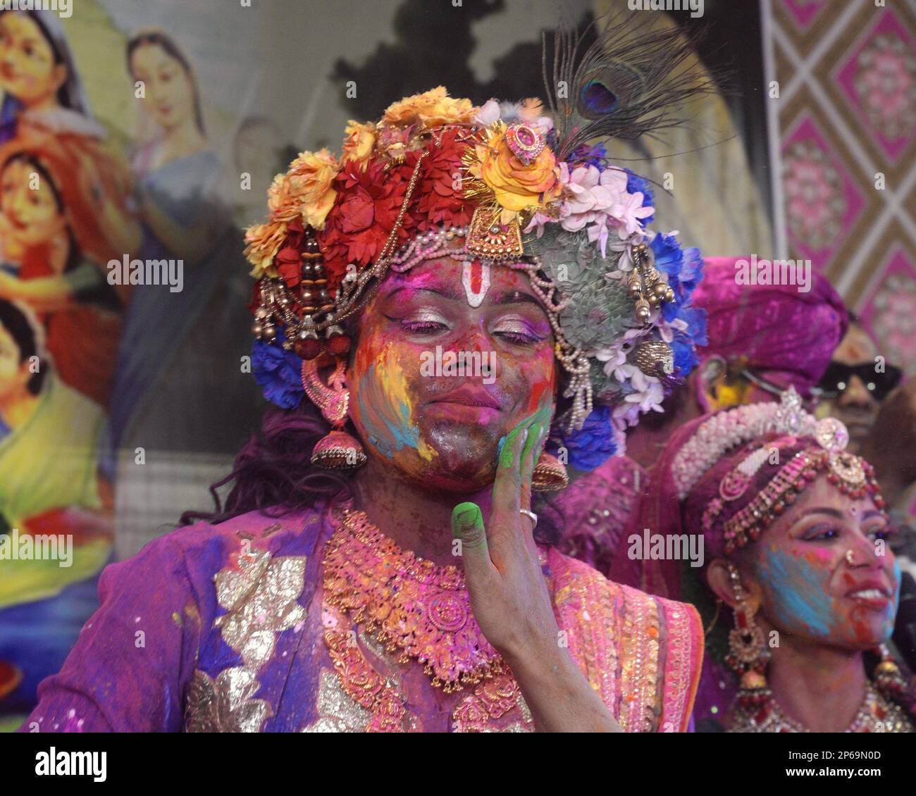 March 7, 2023, Kolkata, India: People smear color to a devotee dressed ...