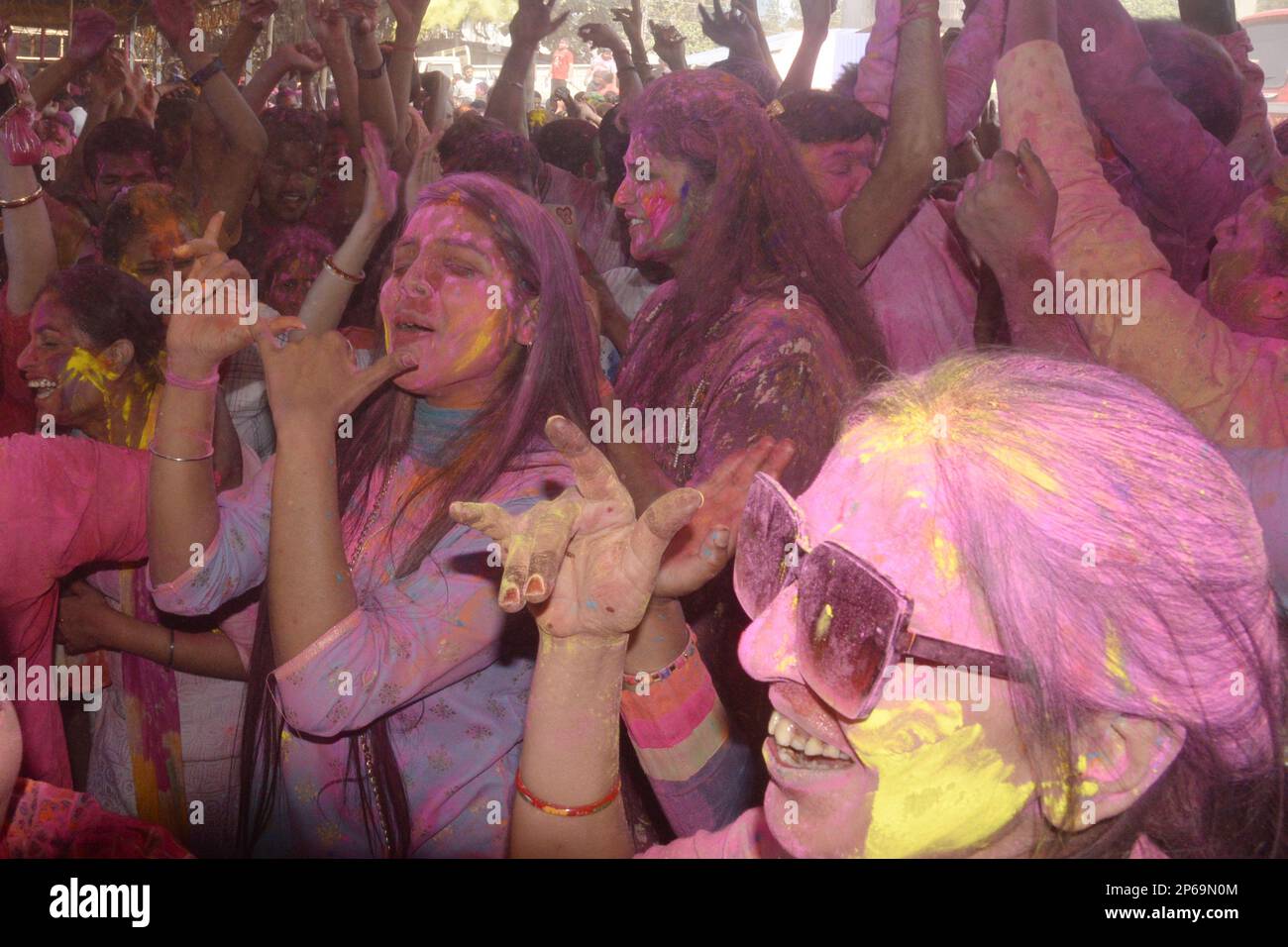 March 7, 2023, Kolkata, India: Devotees dance during Holi Festival, the ...
