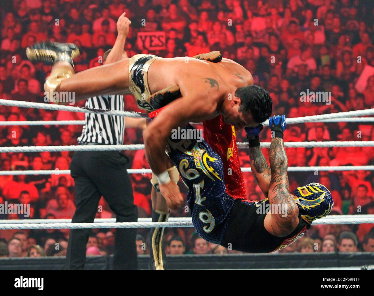 Alberto Del Rio flips over the top of Rey Mysterio as they leave the ...