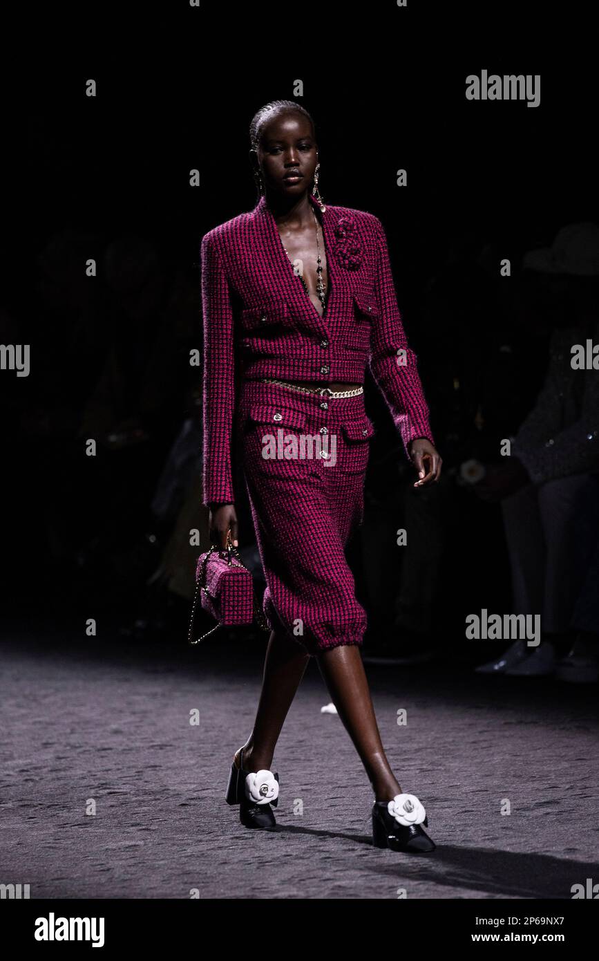 Adut Akech wears a creation as part of the Chanel Fall/Winter 2023-2024 ready-to-wear collection ...