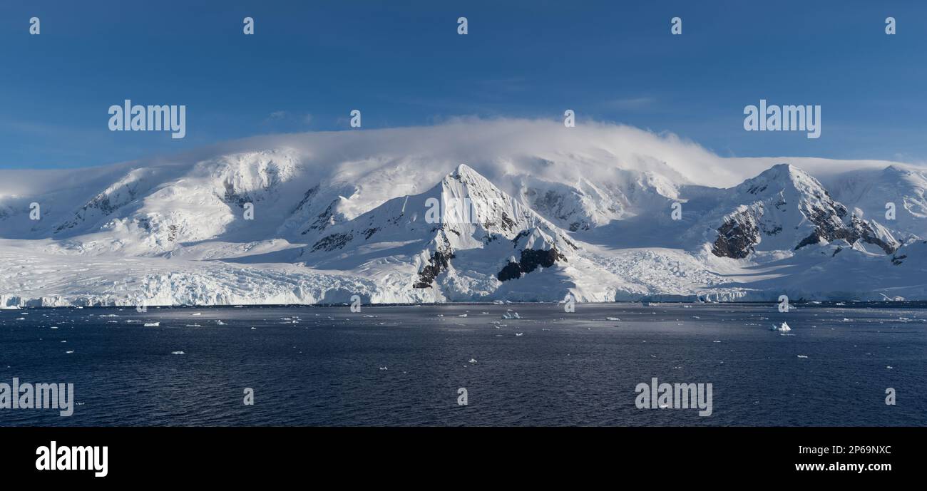 clouds blowing over a mountain range in Antarctica Stock Photo - Alamy