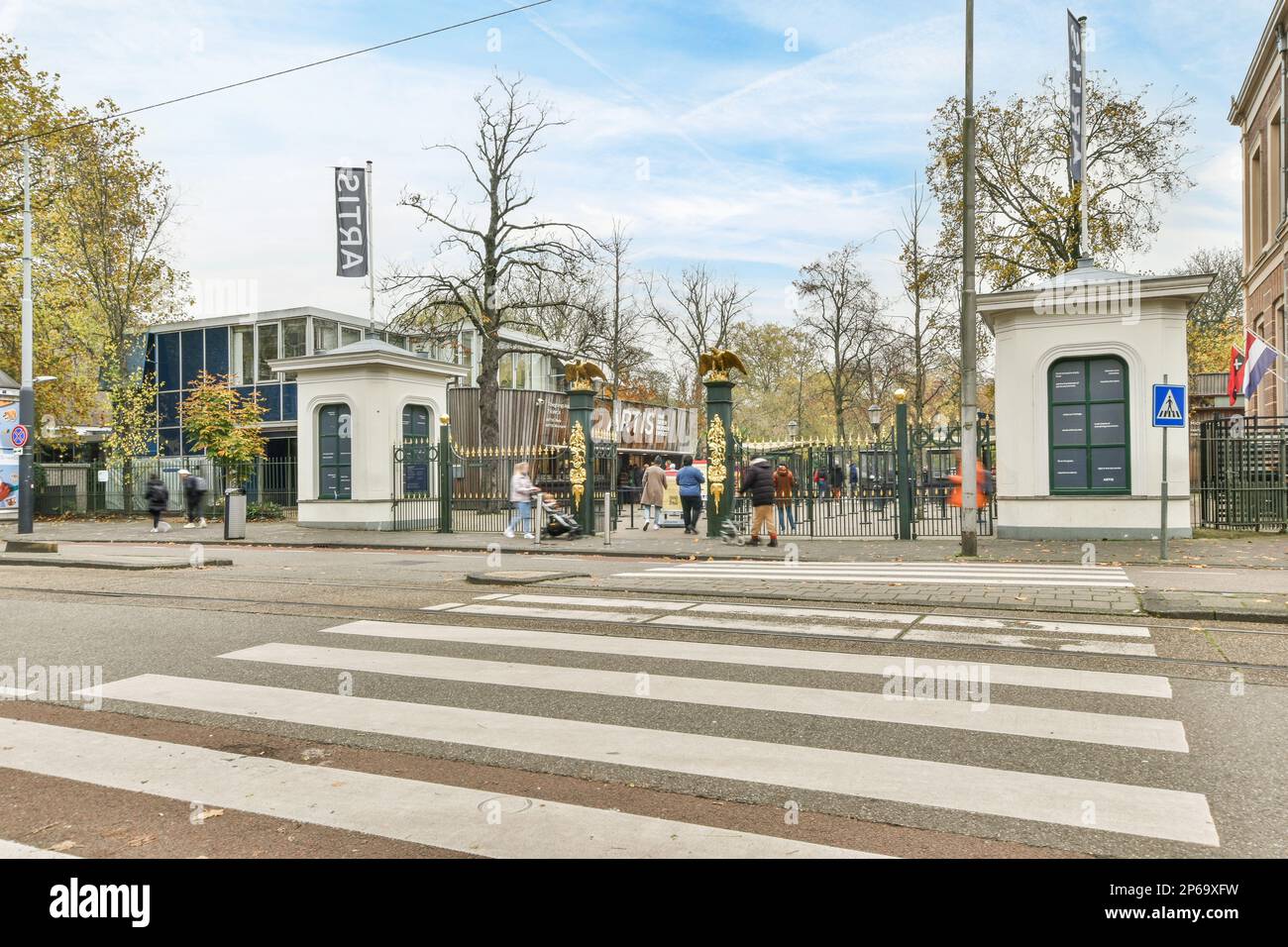 Amsterdam, Netherlands - 10 April, 2021: people crossing the street in ...