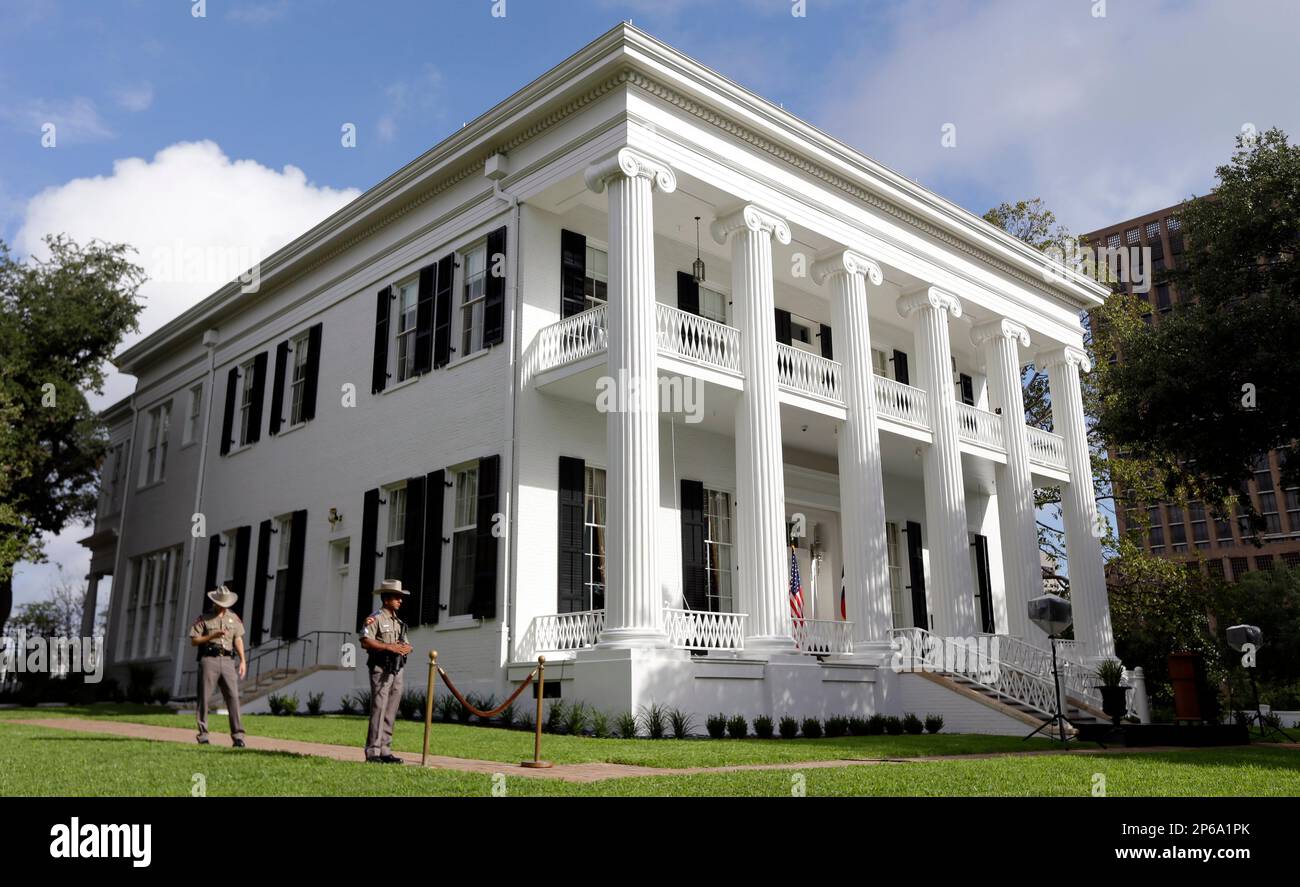 Texas state troopers guard the Texas Governor's Mansion, Wednesday ...
